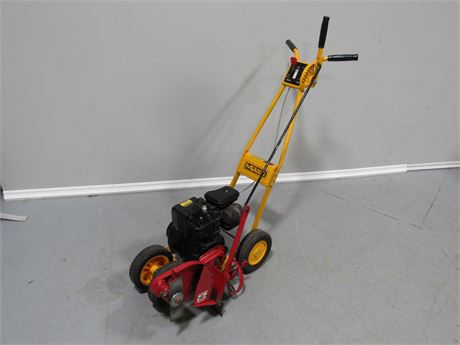 Transitional Design Online Auctions - McLane Lawn Edger - Briggs and ...