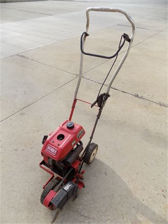 Transitional Design Online Auctions - Toro gas Powered Edger