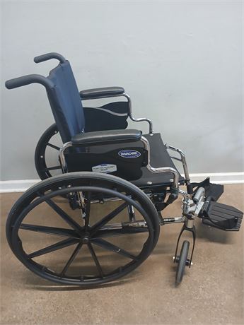 Transitional Design Online Auctions - Wheelchair Invacare Model 9000 XT
